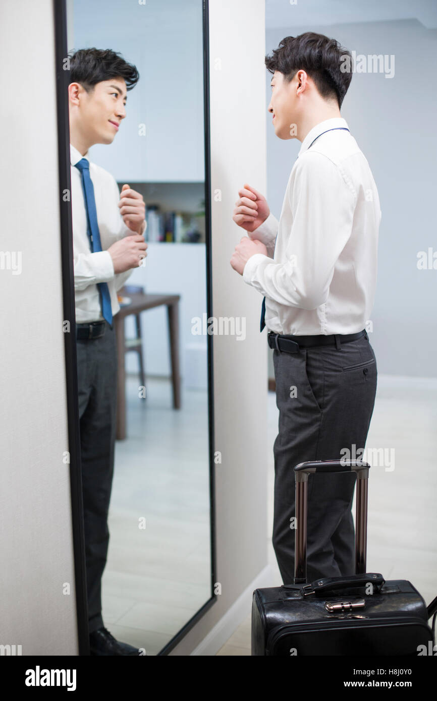 Man checking himself mirror hi-res stock photography and images - Alamy