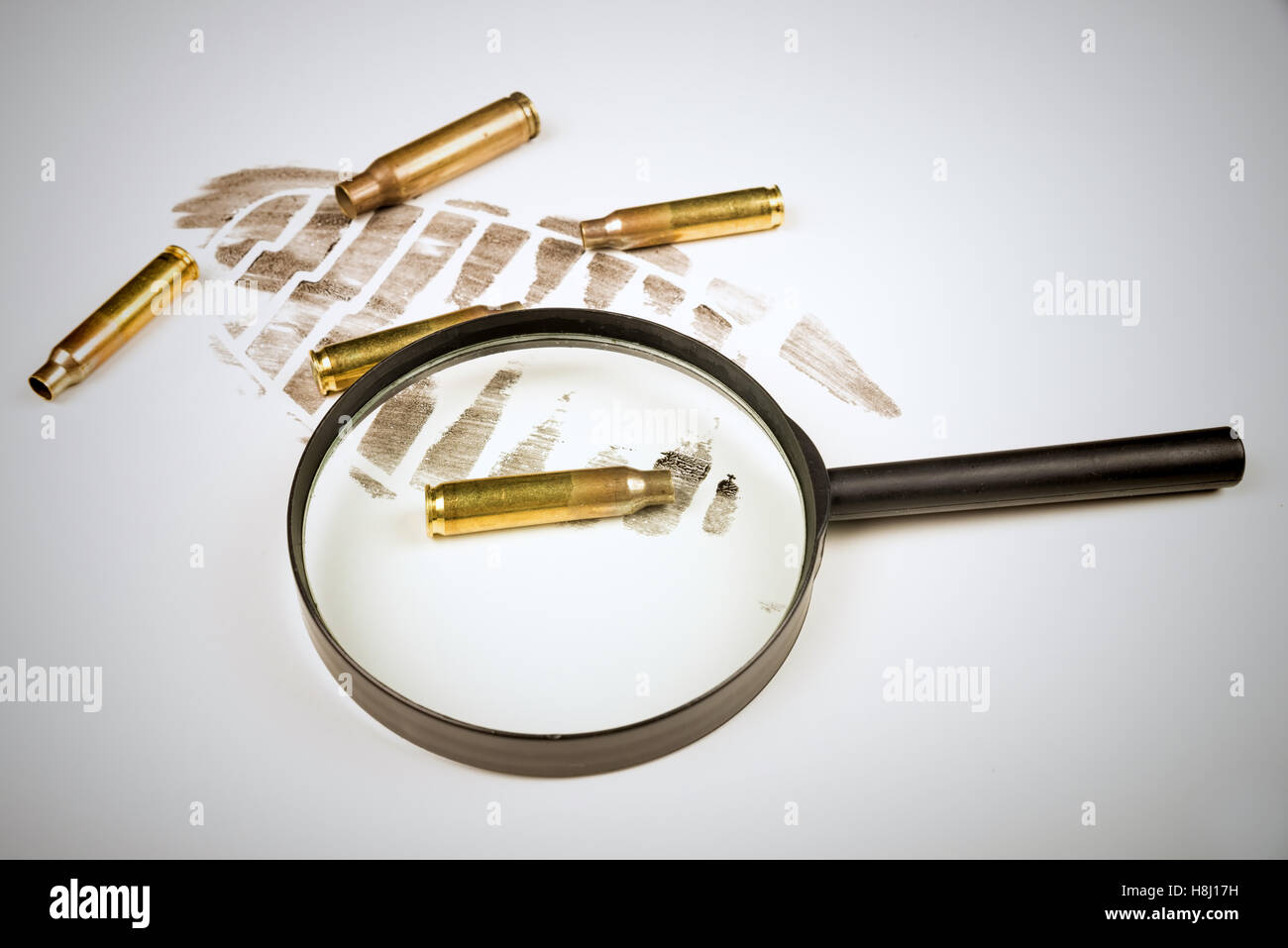 Footprint and bullet shells on a crime scene, a concept Stock Photo - Alamy