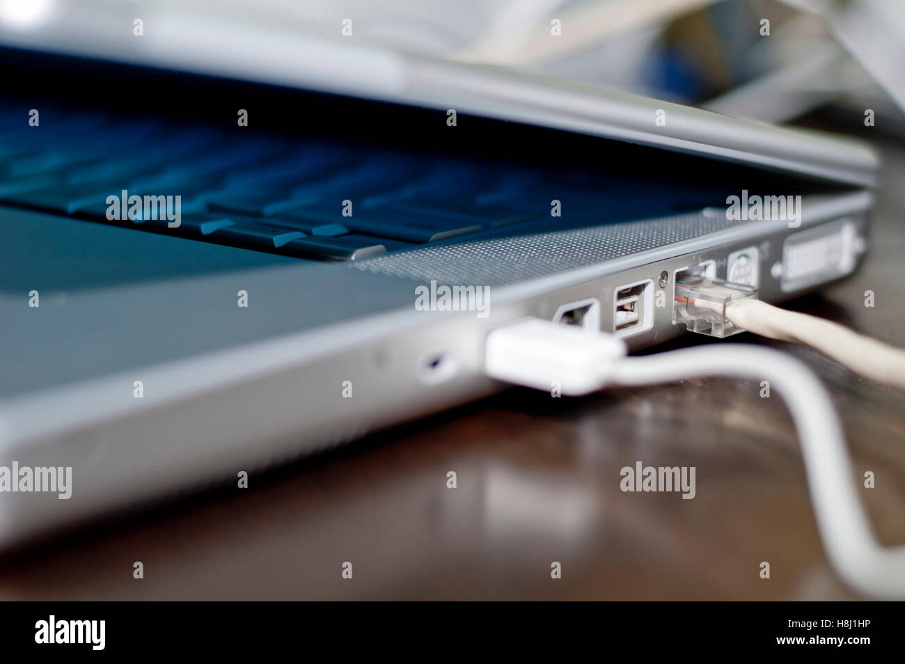 Close-up of laptop ports, including ethernet network Stock Photo - Alamy