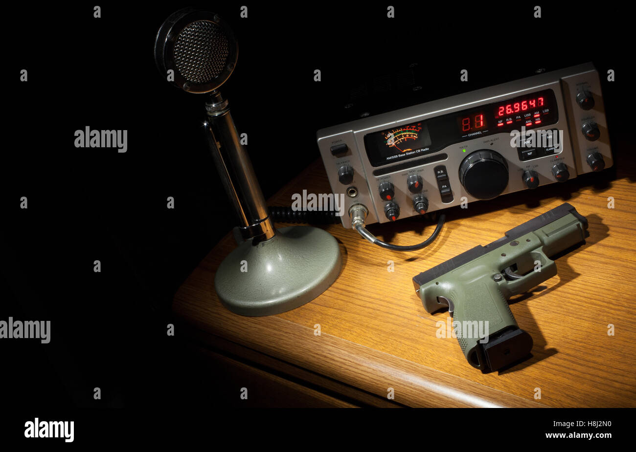 Semi automatic handgun that is next to a radio and microphone Stock ...