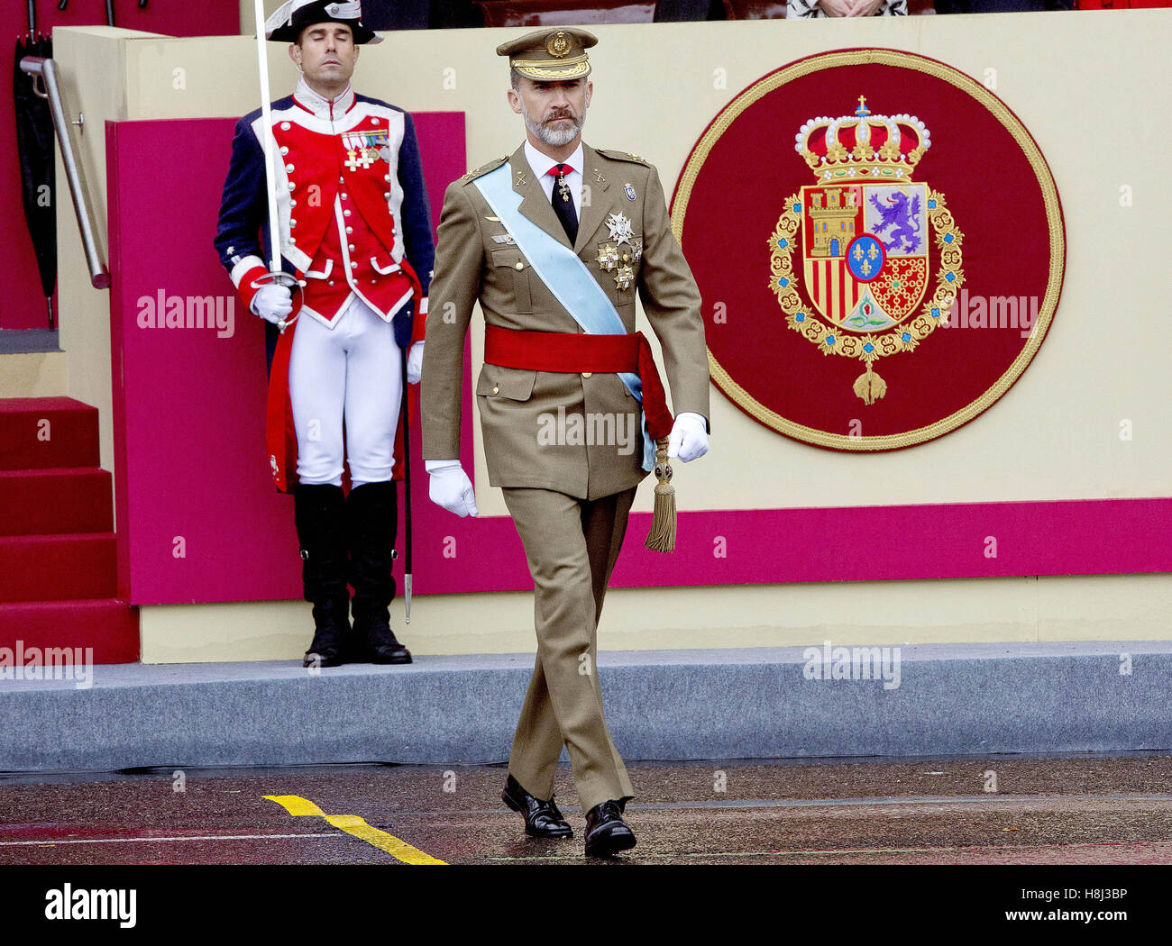 Spanish royals attend the National Day military parade in Madrid ...