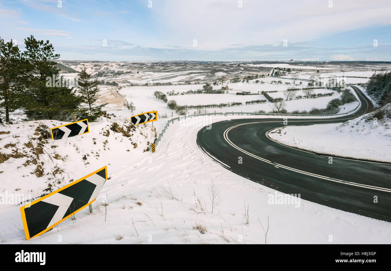 The A169 motorway flanked by the North York Moors covered in snow on a ...