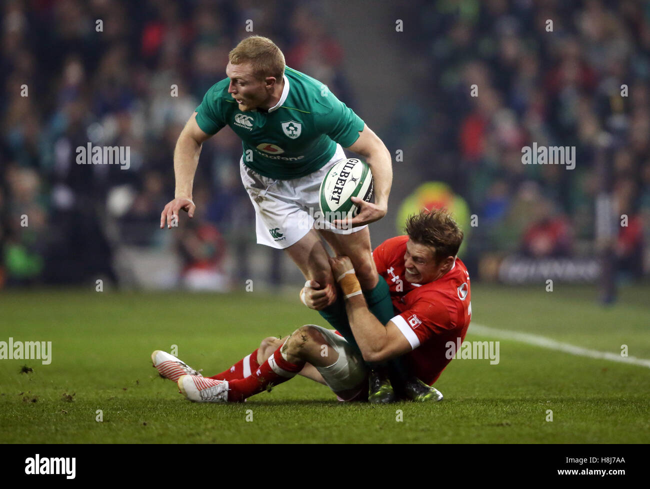 Ireland's Keith Earls is tackled by Canada's Evan Olmstead during the ...