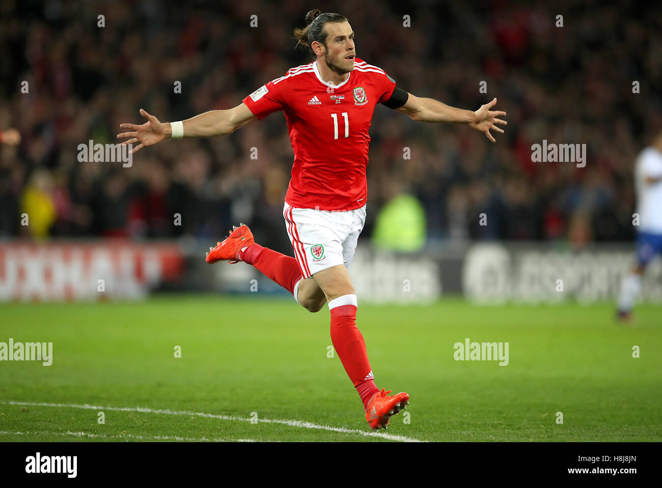 Wales' Gareth Bale celebrates scoring his side's first goal of the game ...