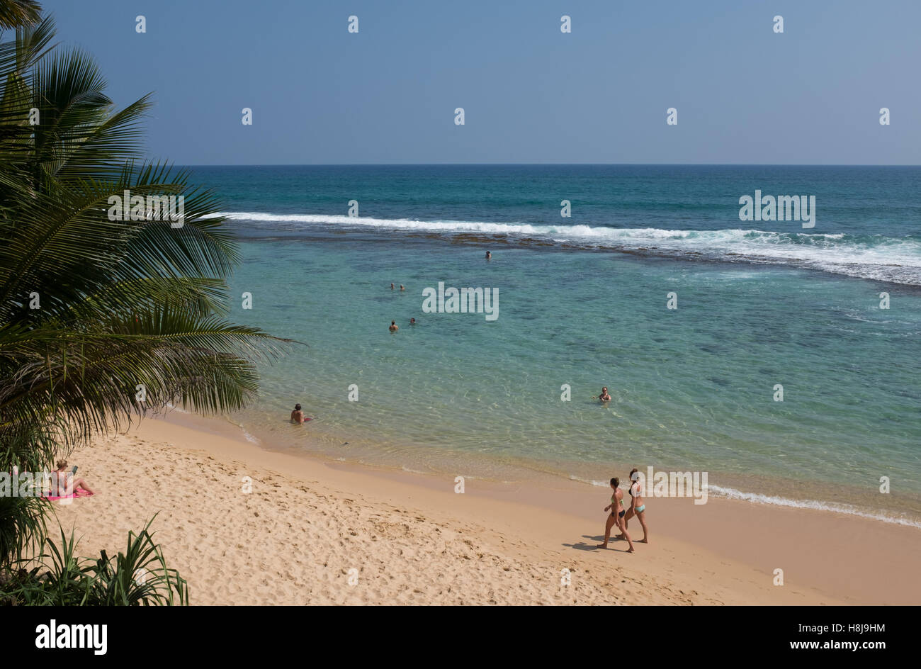 Tourists swimming in clear water hi-res stock photography and images ...