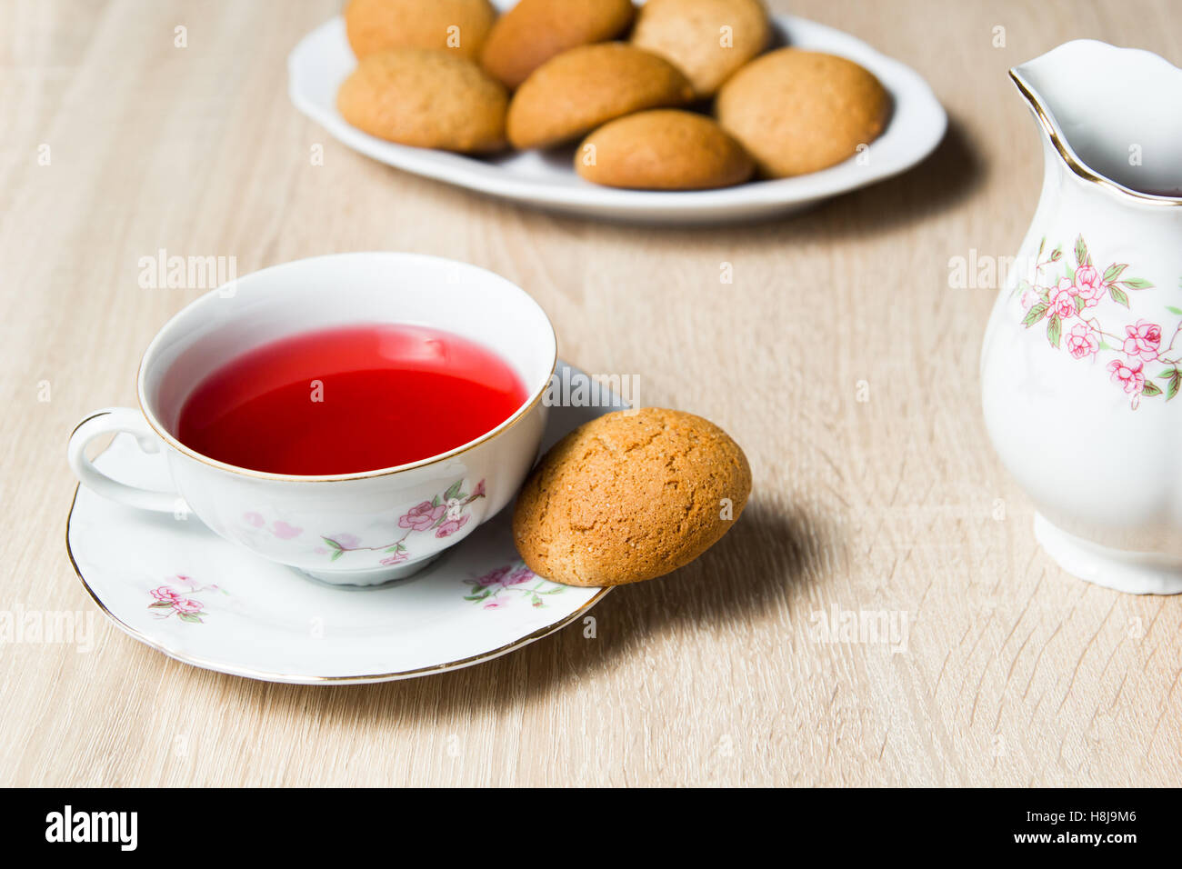 Cup of tea with cookies Stock Photo - Alamy