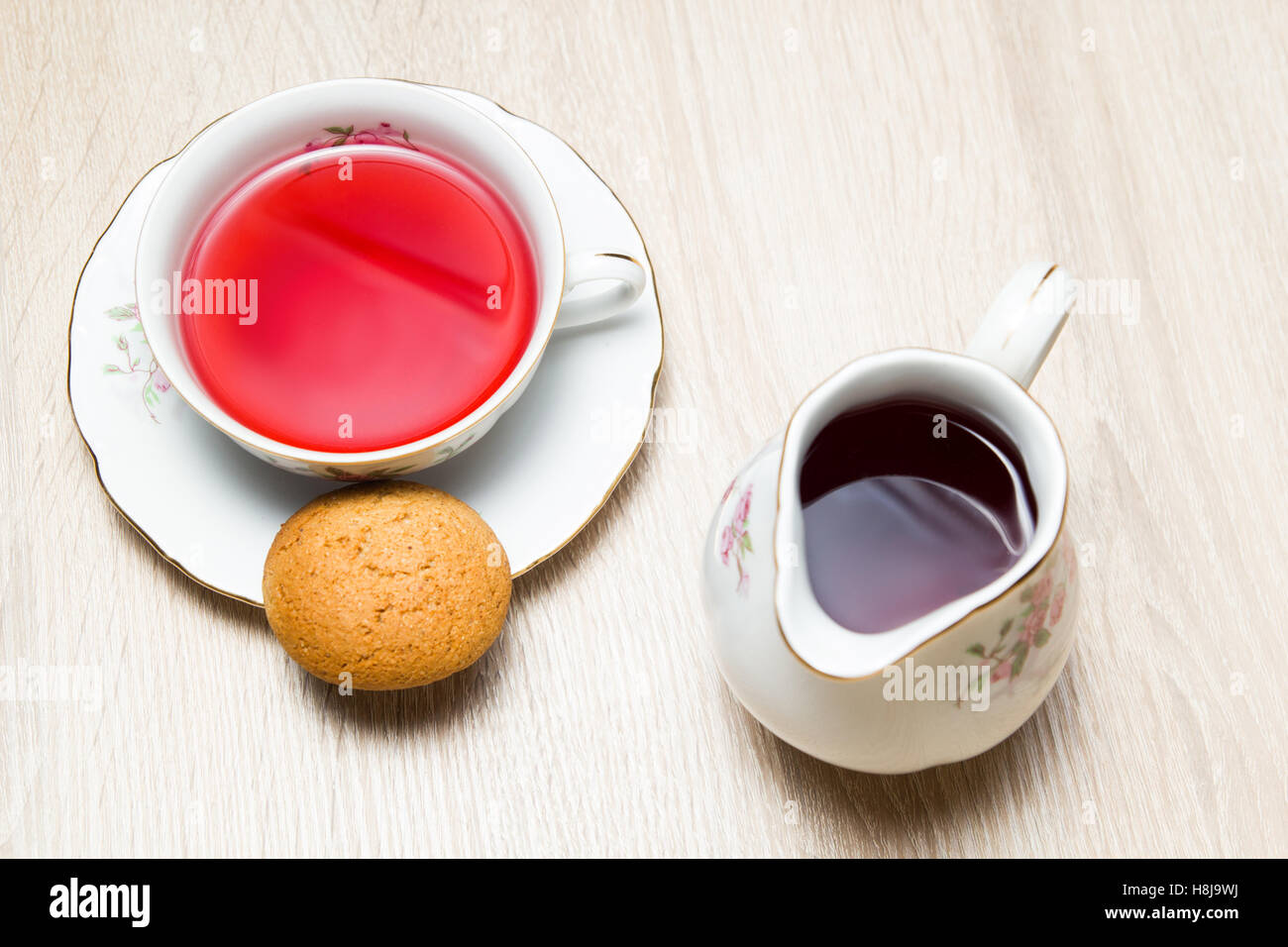 Cup of red tea in elegant teacup Stock Photo - Alamy