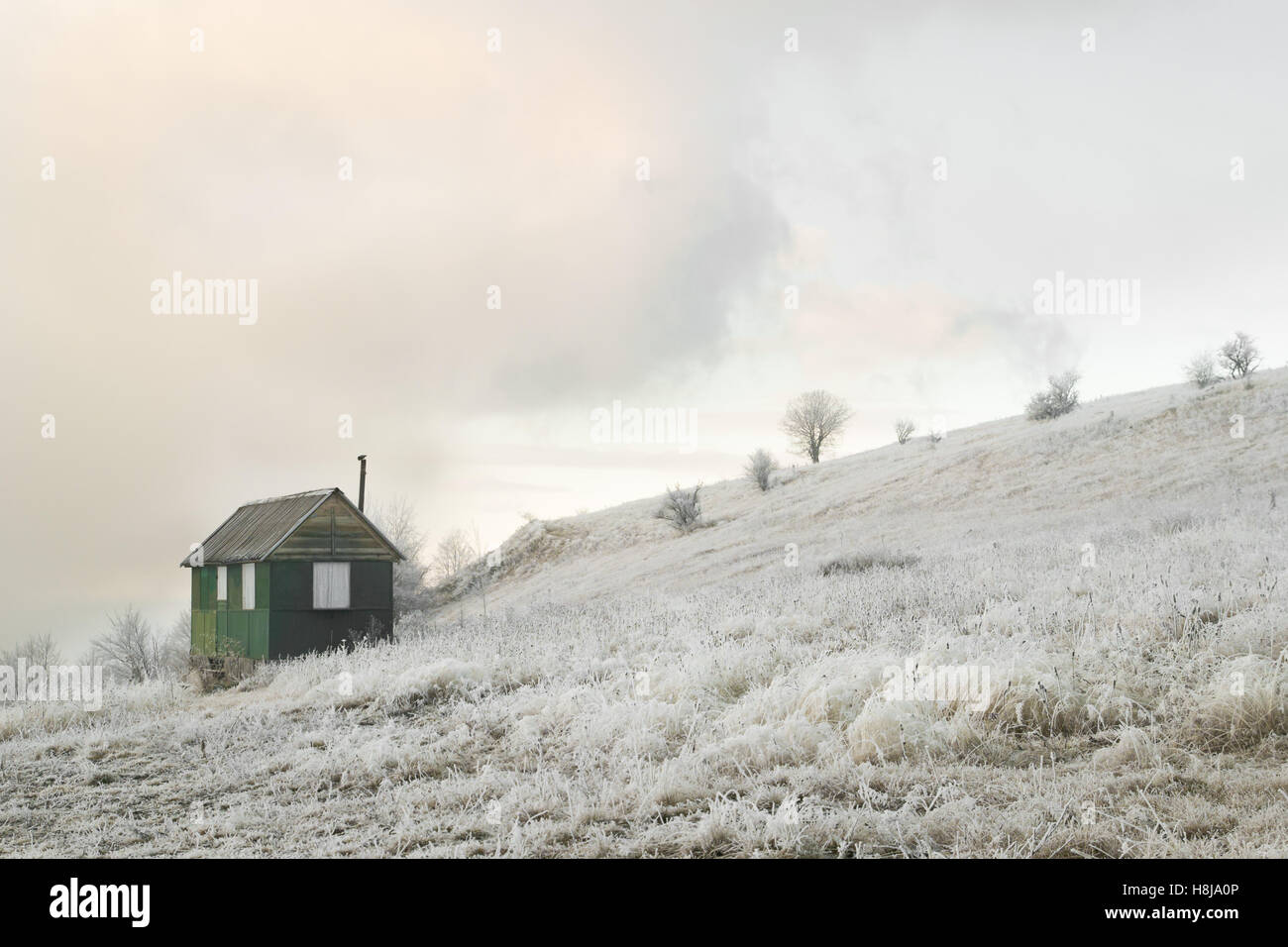Lonely house on mountain winter scene Stock Photo - Alamy