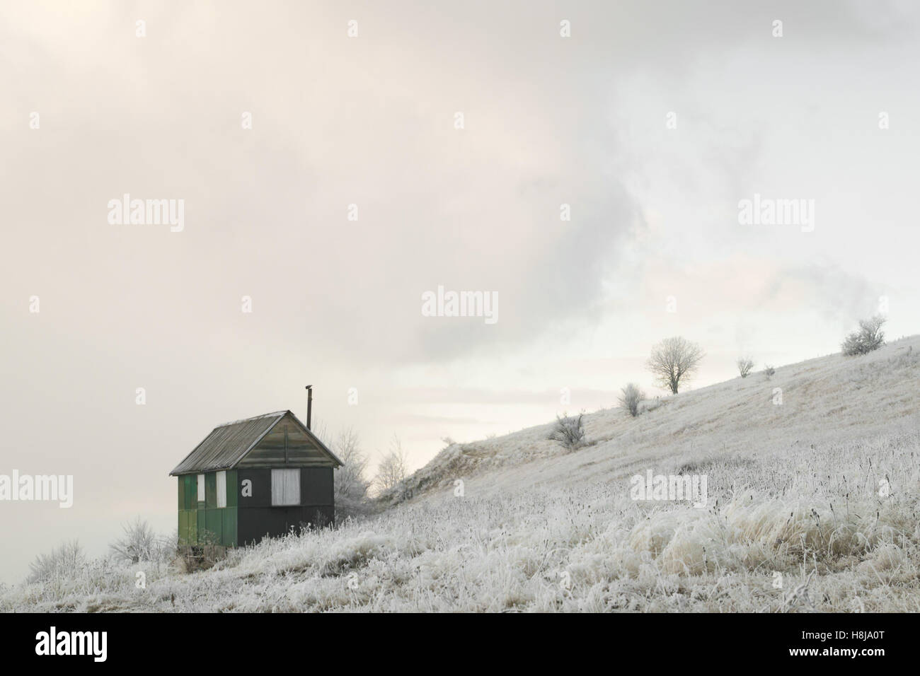 Lonely house on mountain winter scene Stock Photo - Alamy