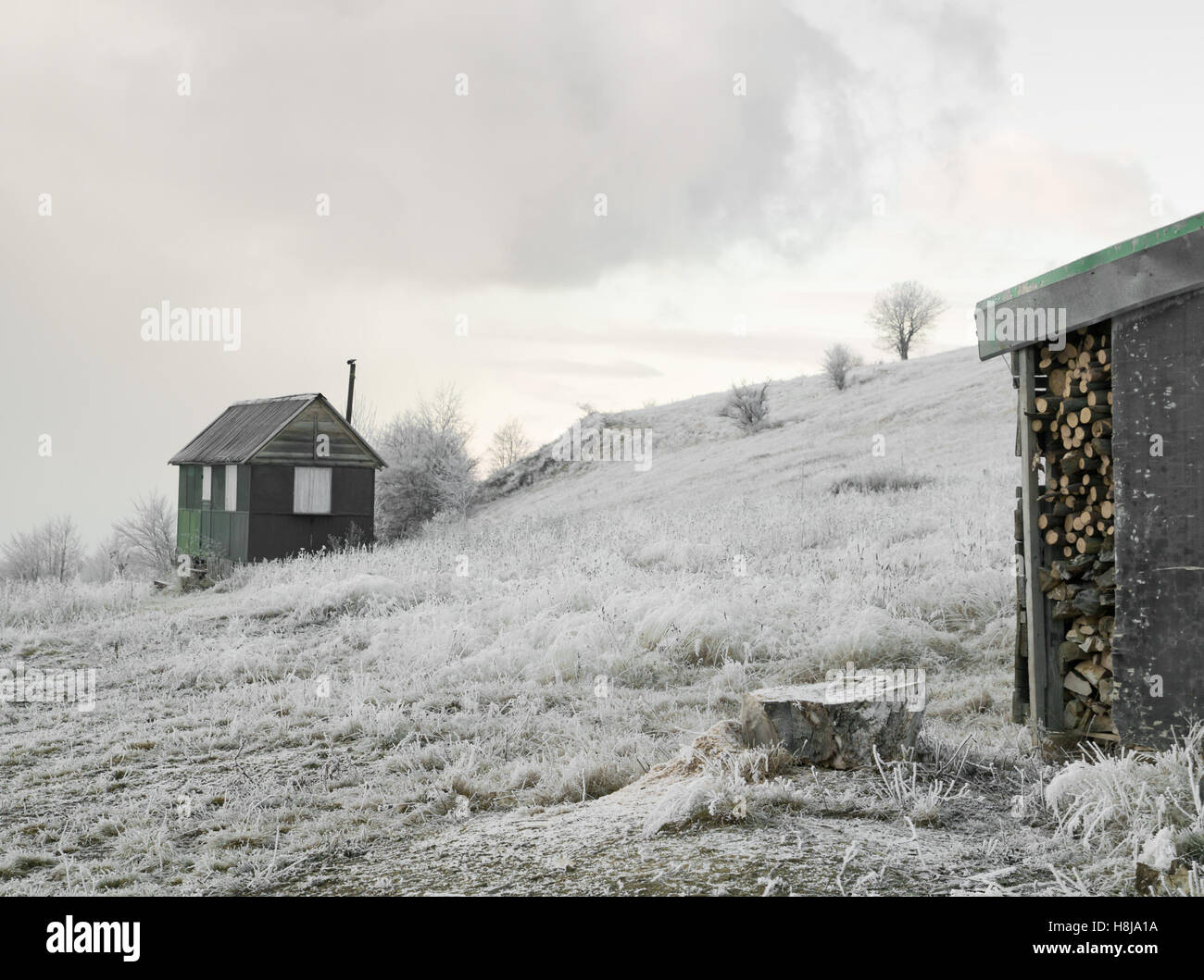 Lonely house on mountain winter scene Stock Photo - Alamy