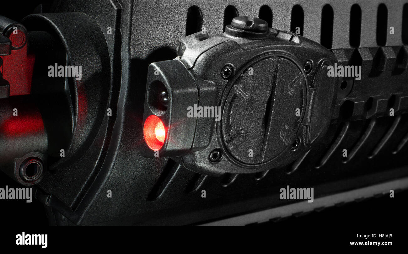 Weaponlight on an AR-15 that is glowing red Stock Photo - Alamy