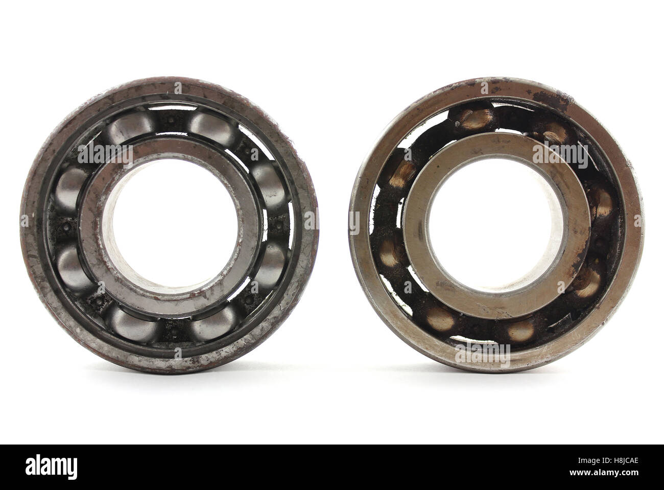Two old rusty bearing on a white background Stock Photo - Alamy