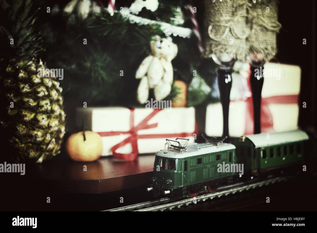 train under tree gift Stock Photo - Alamy