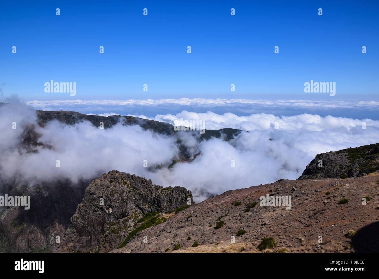Clouds rolling in over the mountains of Madeira Stock Photo - Alamy