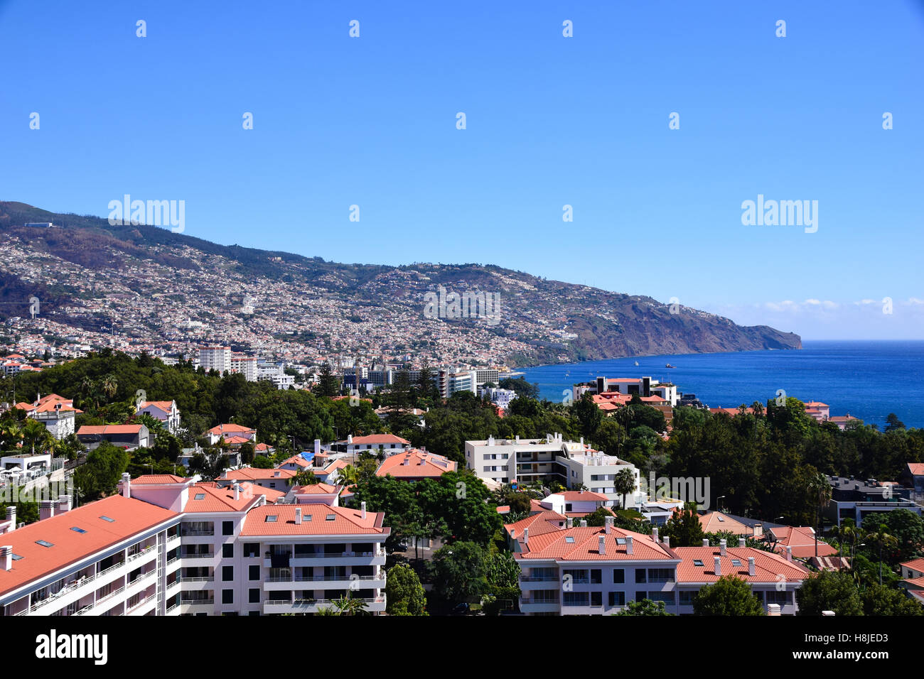 High rise building with traditional daylight and roofs hi-res stock ...