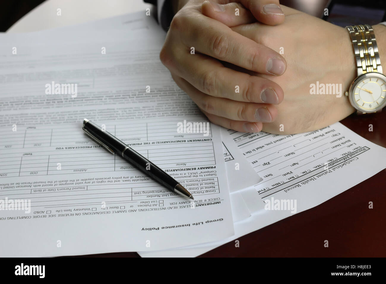 hand signed insurance Stock Photo - Alamy
