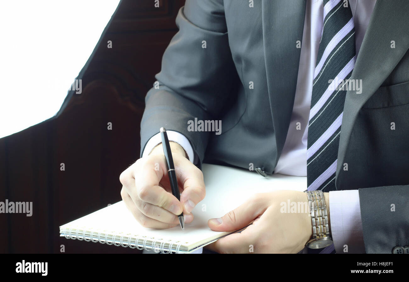 hand writing notes journalist Stock Photo - Alamy
