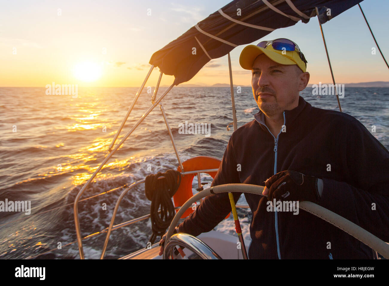 Man sailing boat hi-res stock photography and images - Alamy
