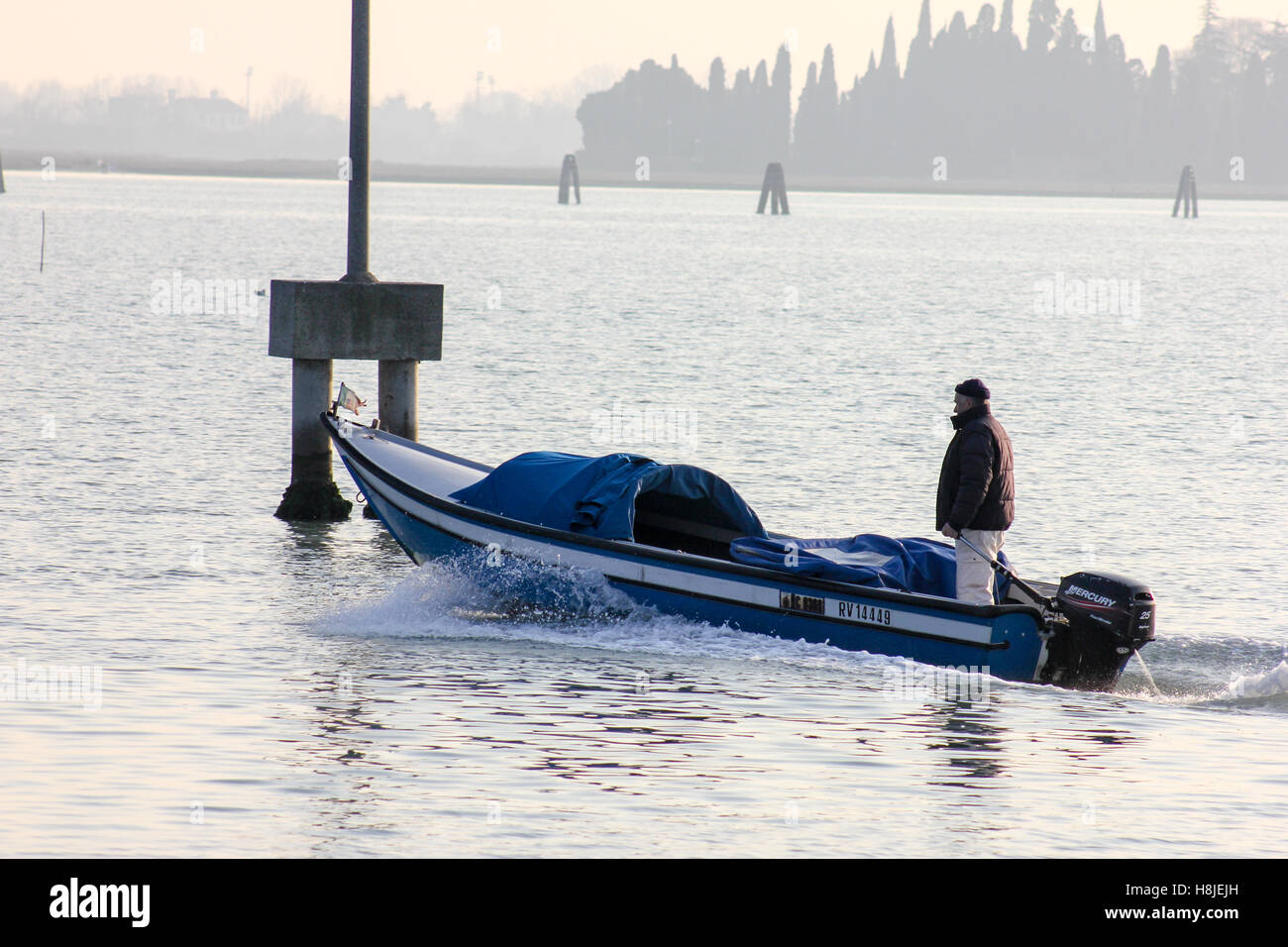 Boat on open water in Venice Stock Photo - Alamy