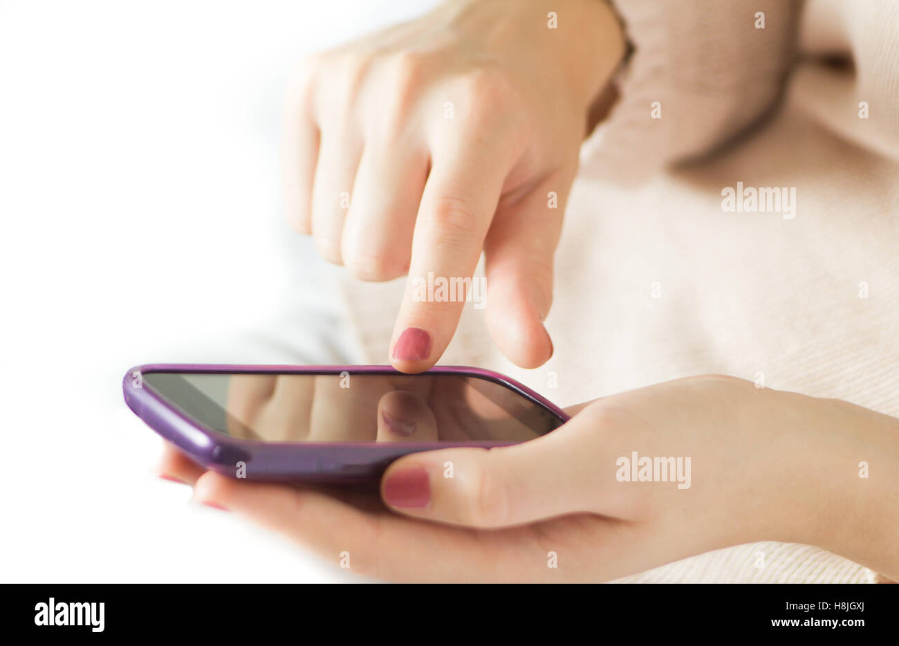 Female hands using mobile Stock Photo - Alamy