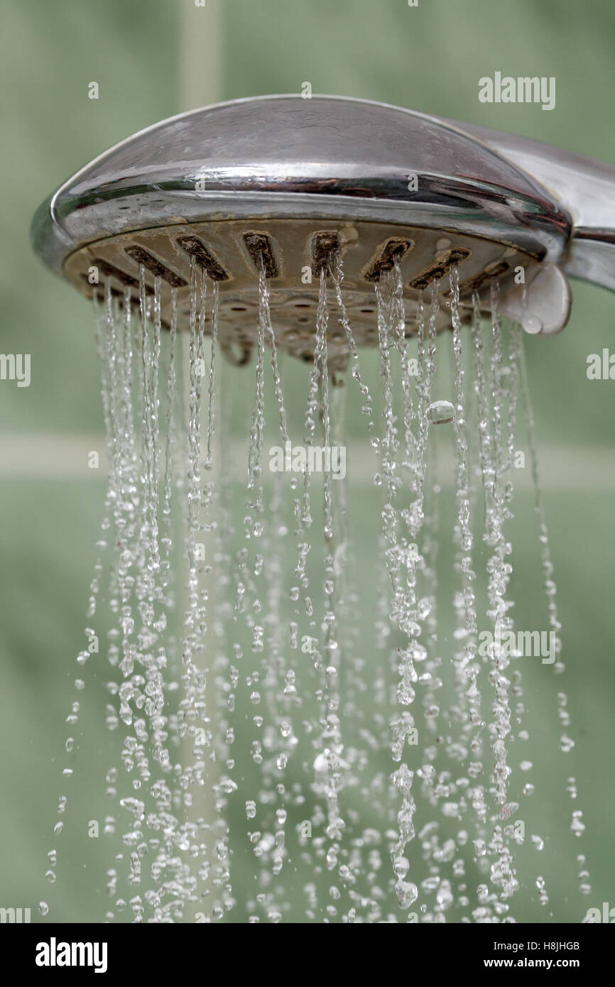 Closeup of shower head with flowing water splashing out, drops Stock ...