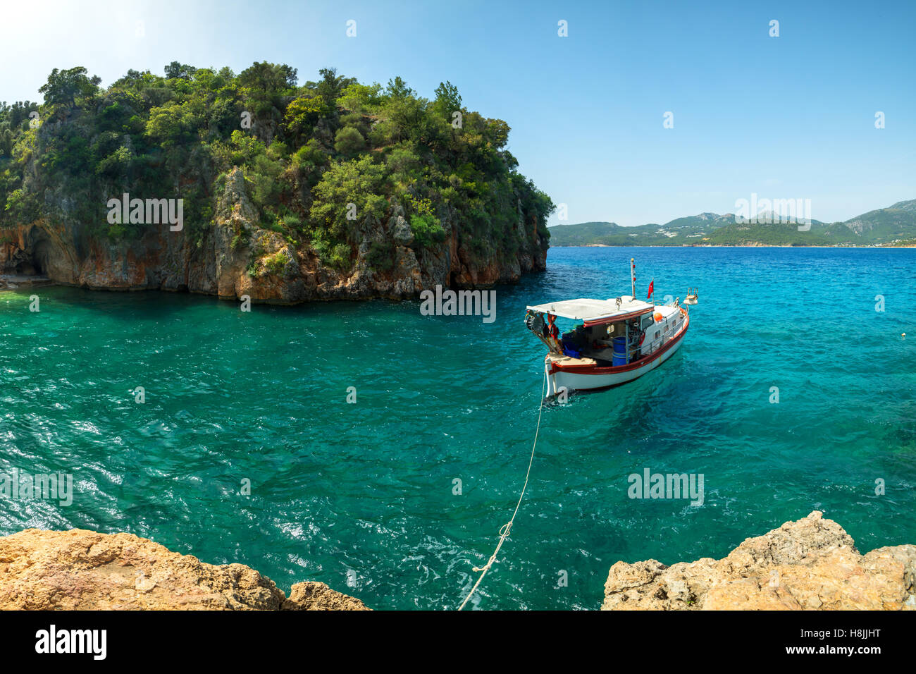 amazing lagoon with alone boat Stock Photo - Alamy