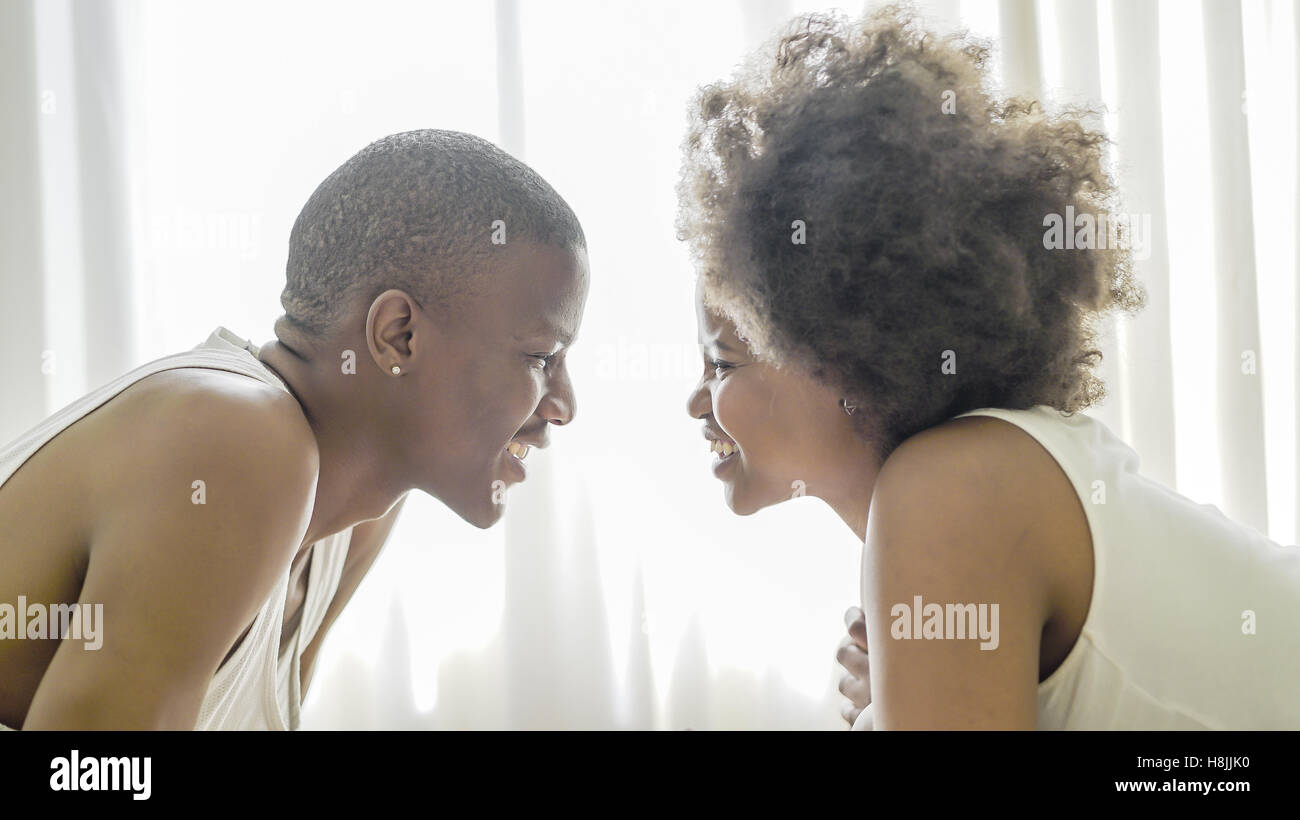 African couple in love in bedroom Stock Photo - Alamy