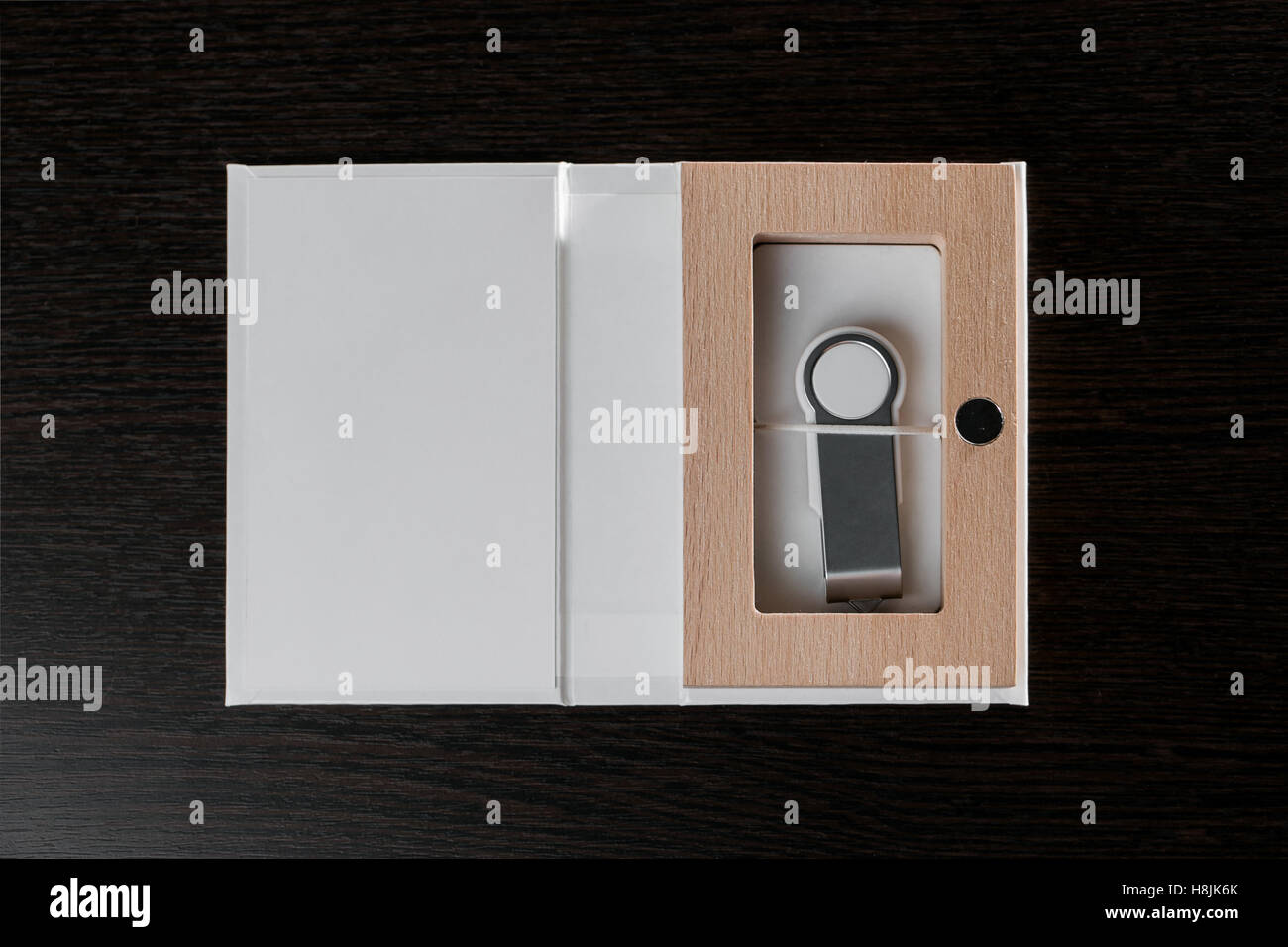 Packaging for USB drives. Handmade box. Wooden boxes on dark background ...