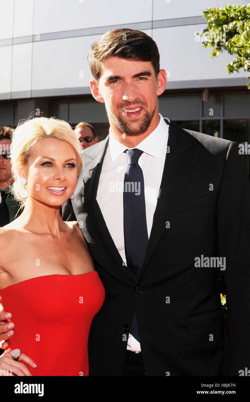 Olympic swimmer Michael Phelps and Golf Channel reporter Win McMurry ...