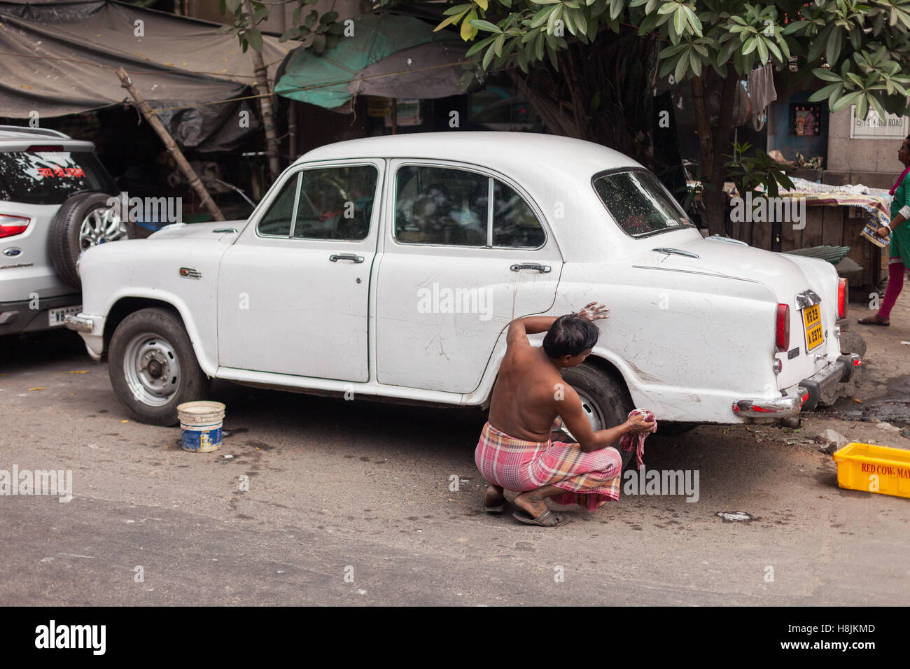 Indian washer man washes hi-res stock photography and images - Alamy