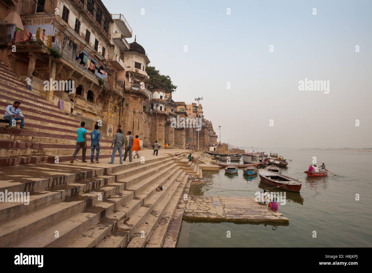 VARANASI, INDIA - 24 Oct 2016: Chousatti Ghat (river steps), boats, and ...
