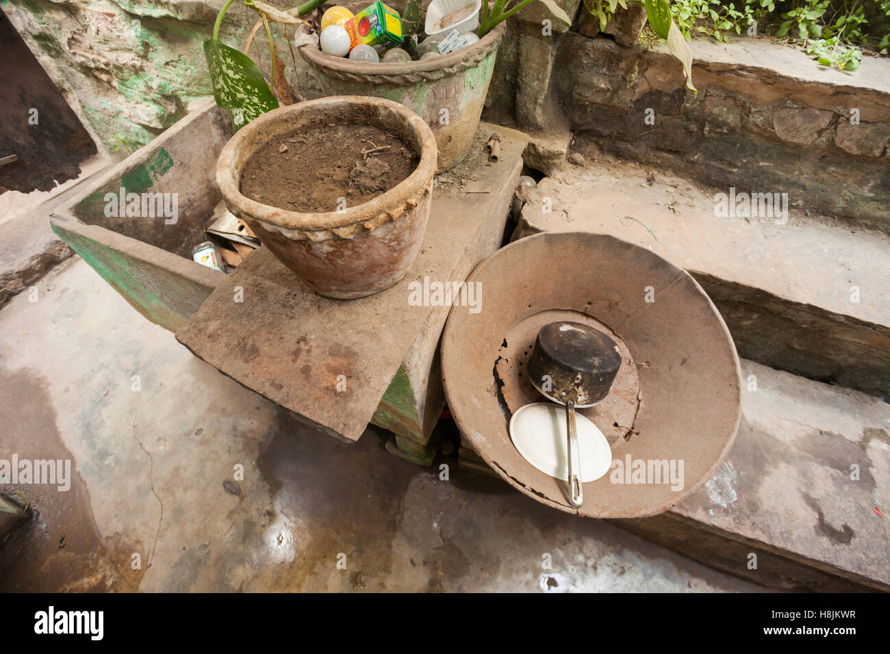 Rusty cooking utensils and garden implements, Varanasi, India Stock ...