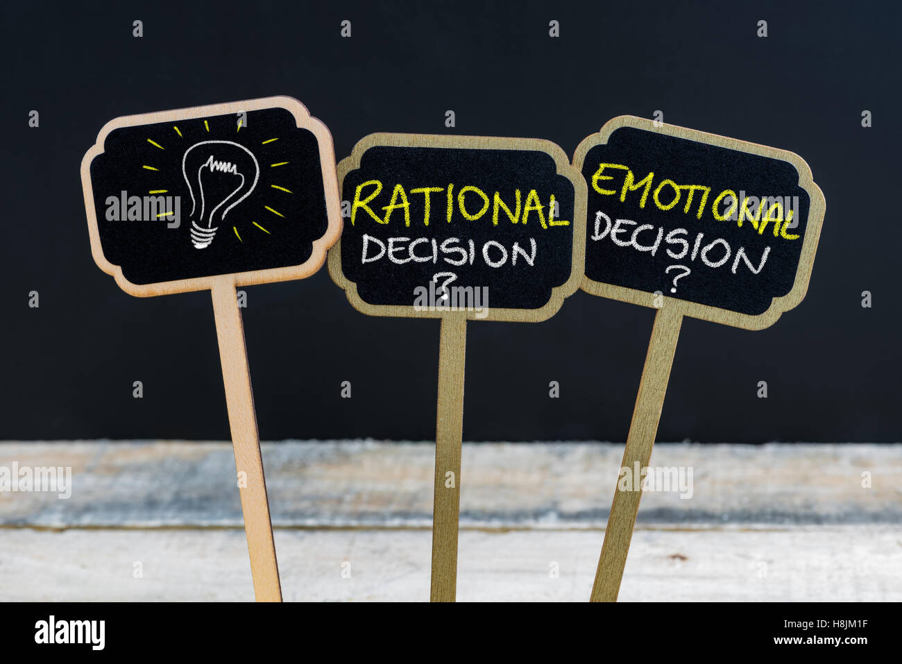 Concept message RATIONAL DECISION versus EMOTIONAL DECISION and light ...