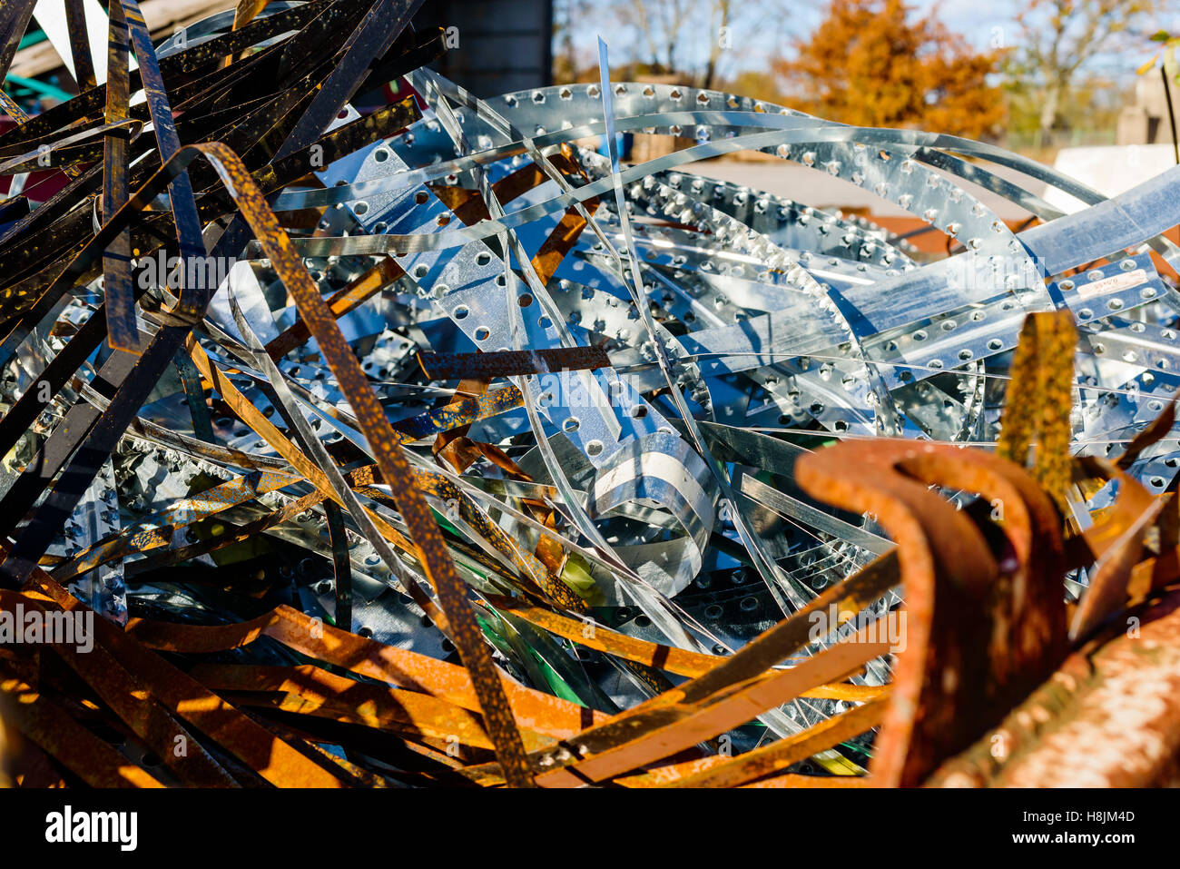Close up of metal waste in rusty old container Stock Photo - Alamy