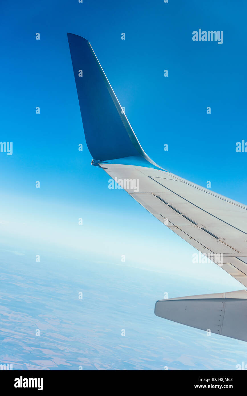 Wing aircraft in the sky Stock Photo - Alamy