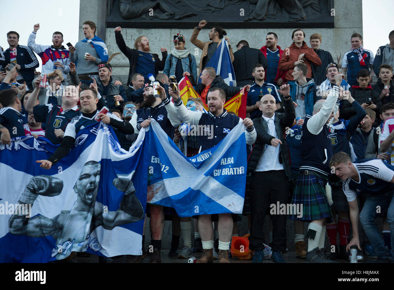 Scotland fans in joyous mood drinking and singing together in Trafalgar ...