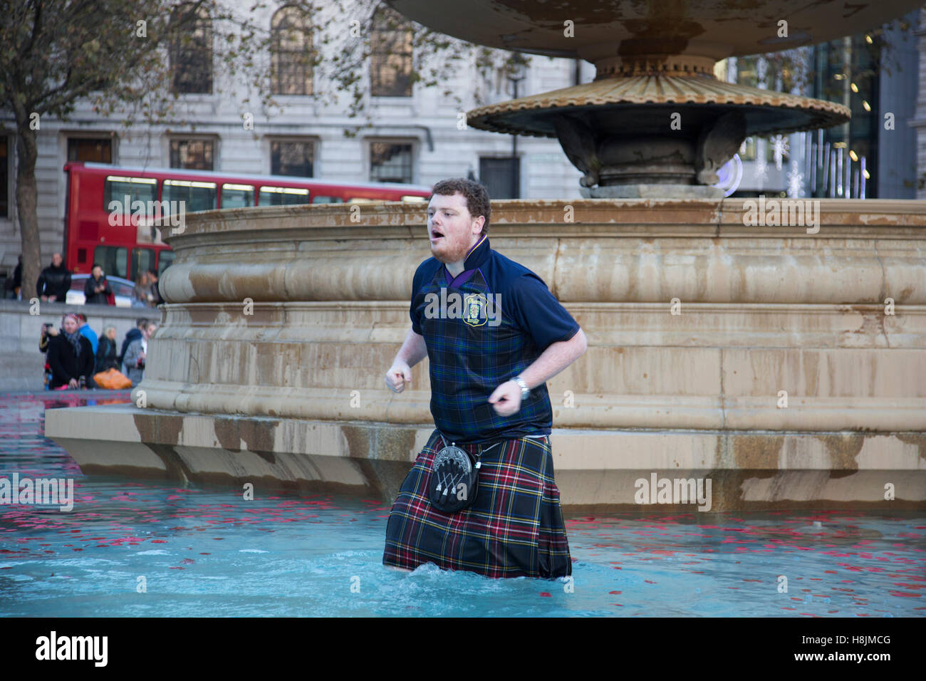 Scotland fans wearing kilts in joyous mood drinking and singing ...