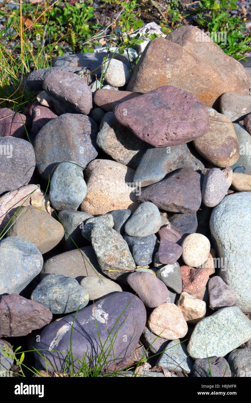 Pile of River Rocks in different shapes and colors Stock Photo - Alamy