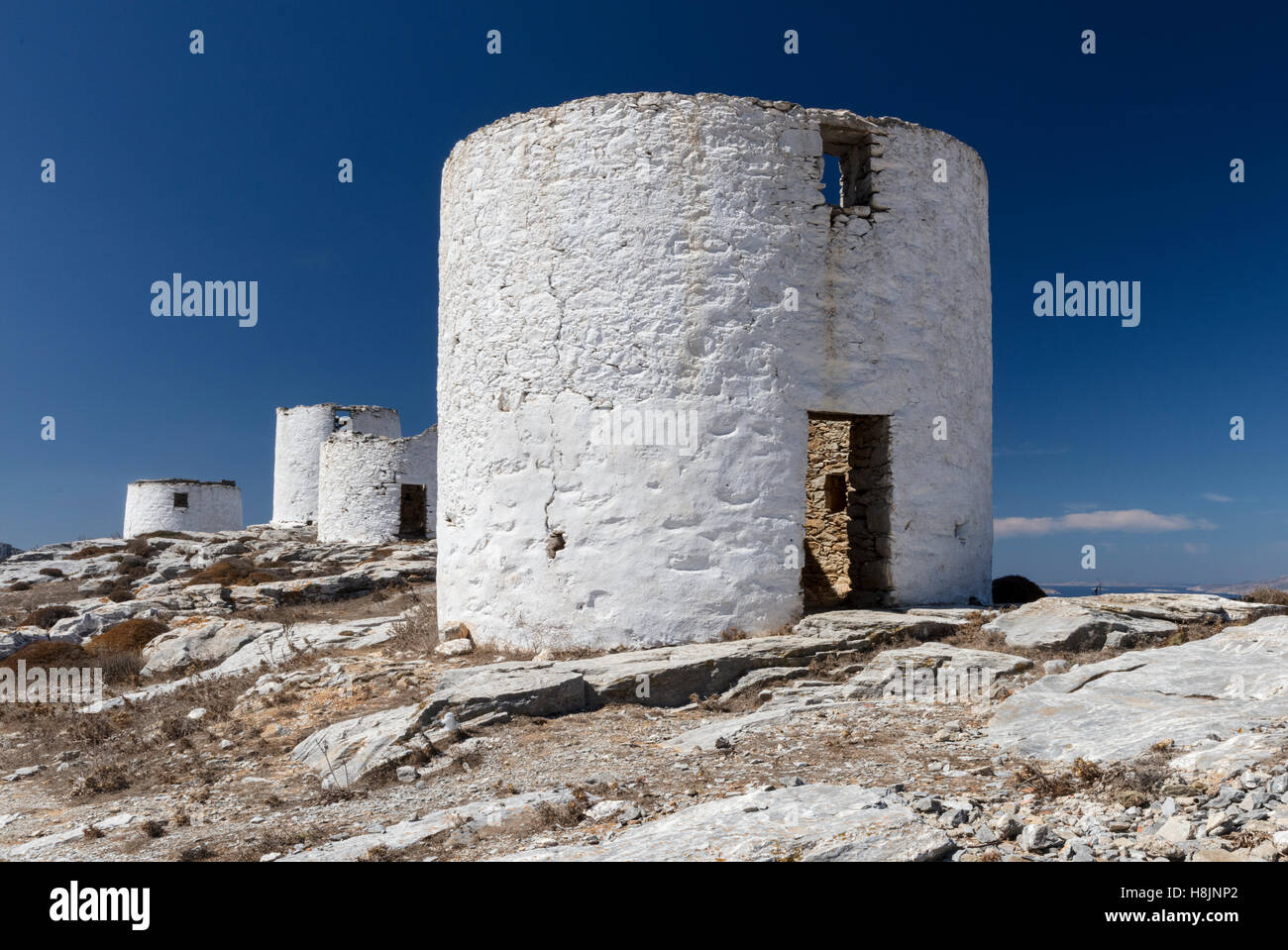 Ruins of windmiills on ridge above the village of Chora (Hora) on ...