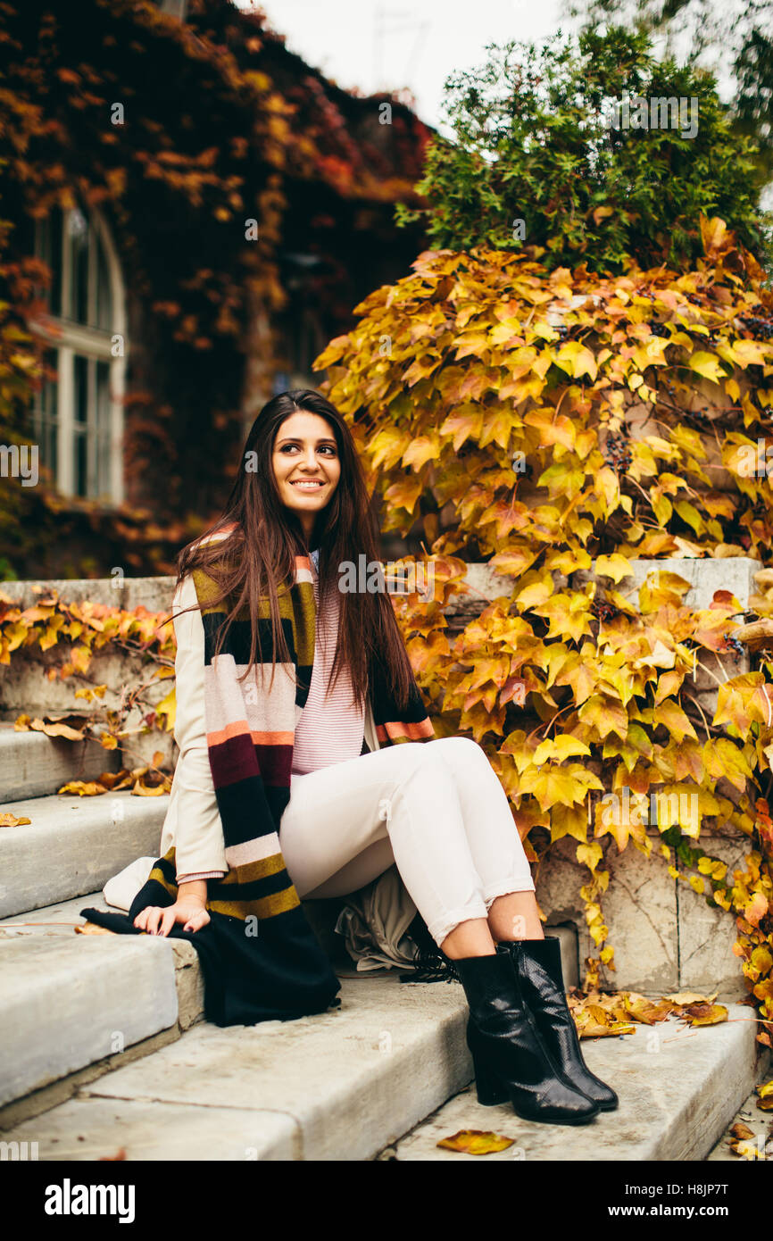 Young woman sitting steps hi-res stock photography and images - Alamy