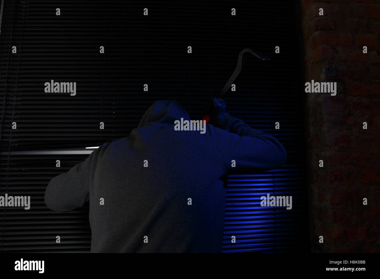 Night thief opens by master key window Stock Photo - Alamy