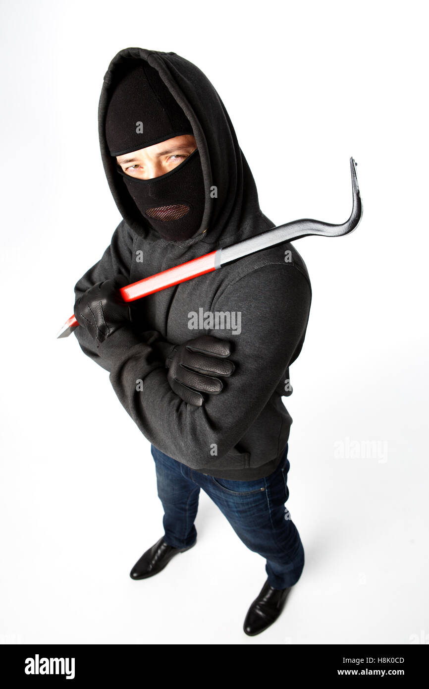 Attacker with master key on pure white background Stock Photo - Alamy