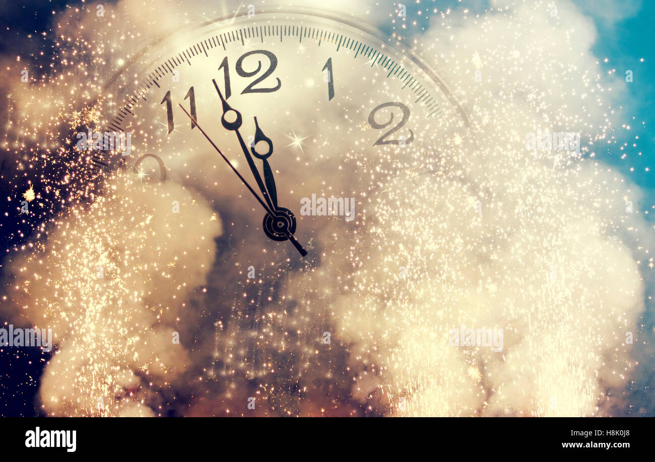 Background of holiday lights and clock close to midnight Stock Photo ...