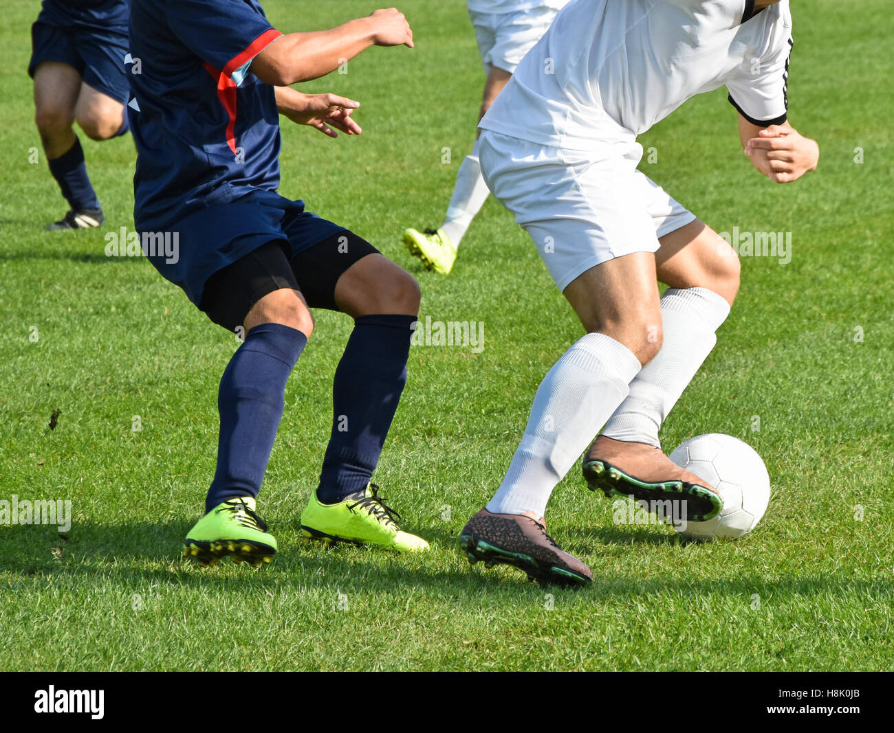 Soccer players in action outdoors Stock Photo - Alamy