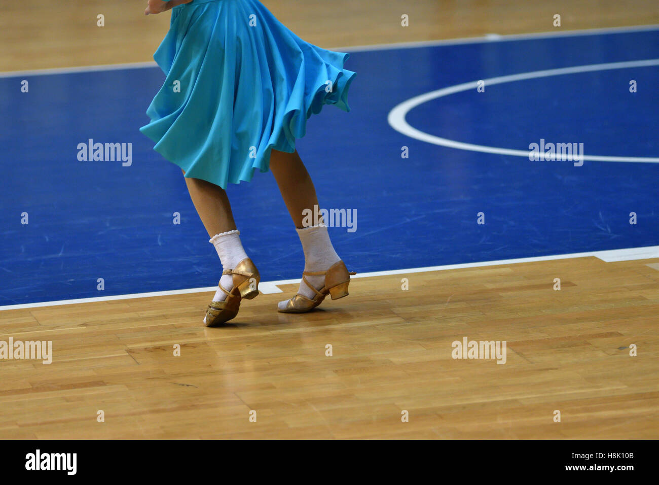 Legs of a dancing girl in the competition on sports dances Stock Photo ...