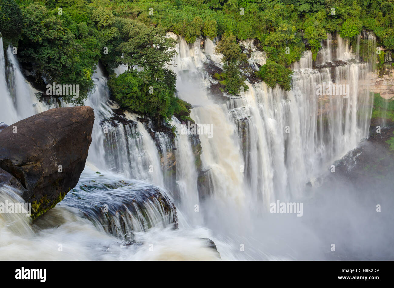 Kalandula waterfalls of Angola in full flow with lush green rain forest ...