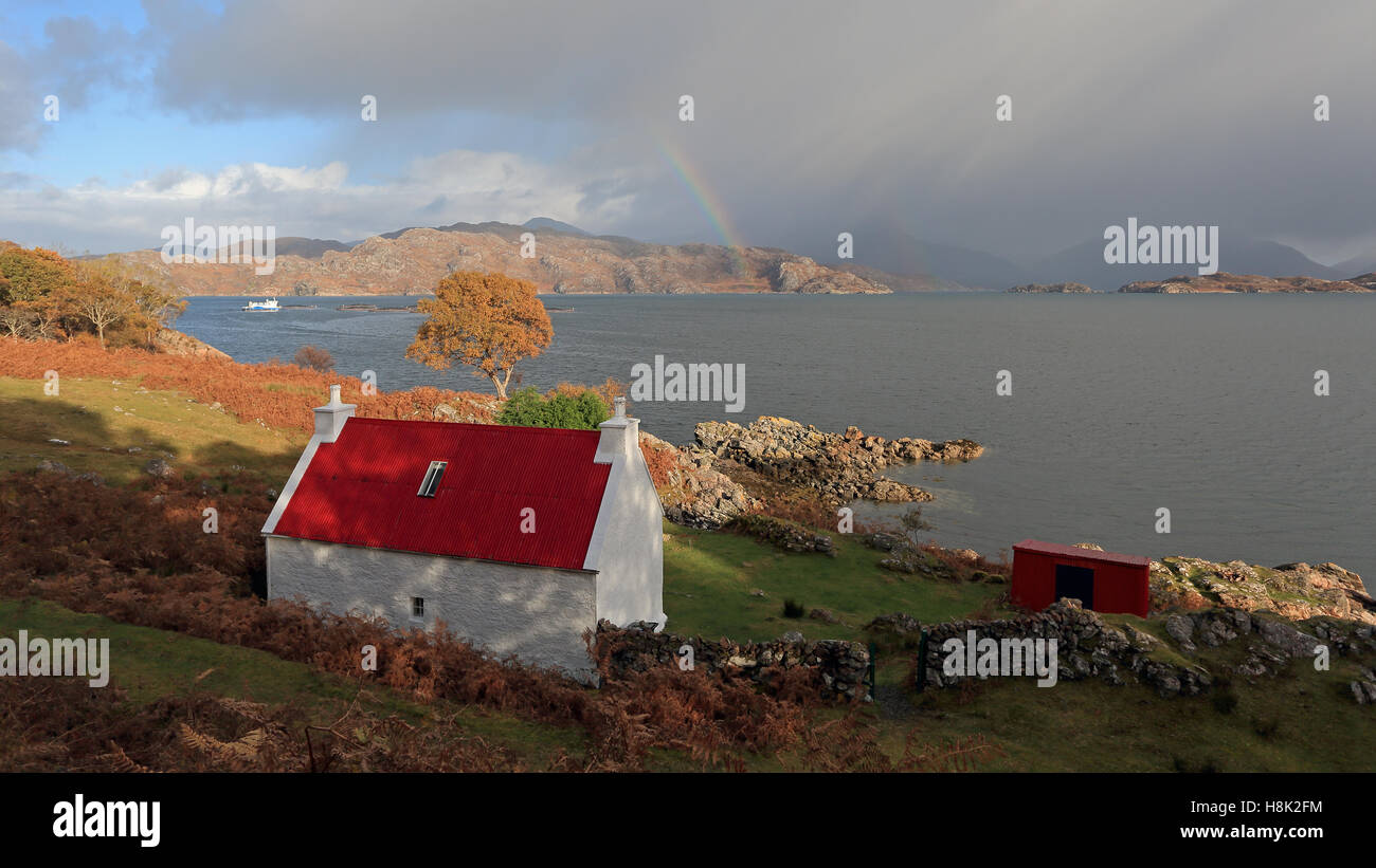 Lovely white cottage with red roof by the shores of Loch Shieldaig in ...