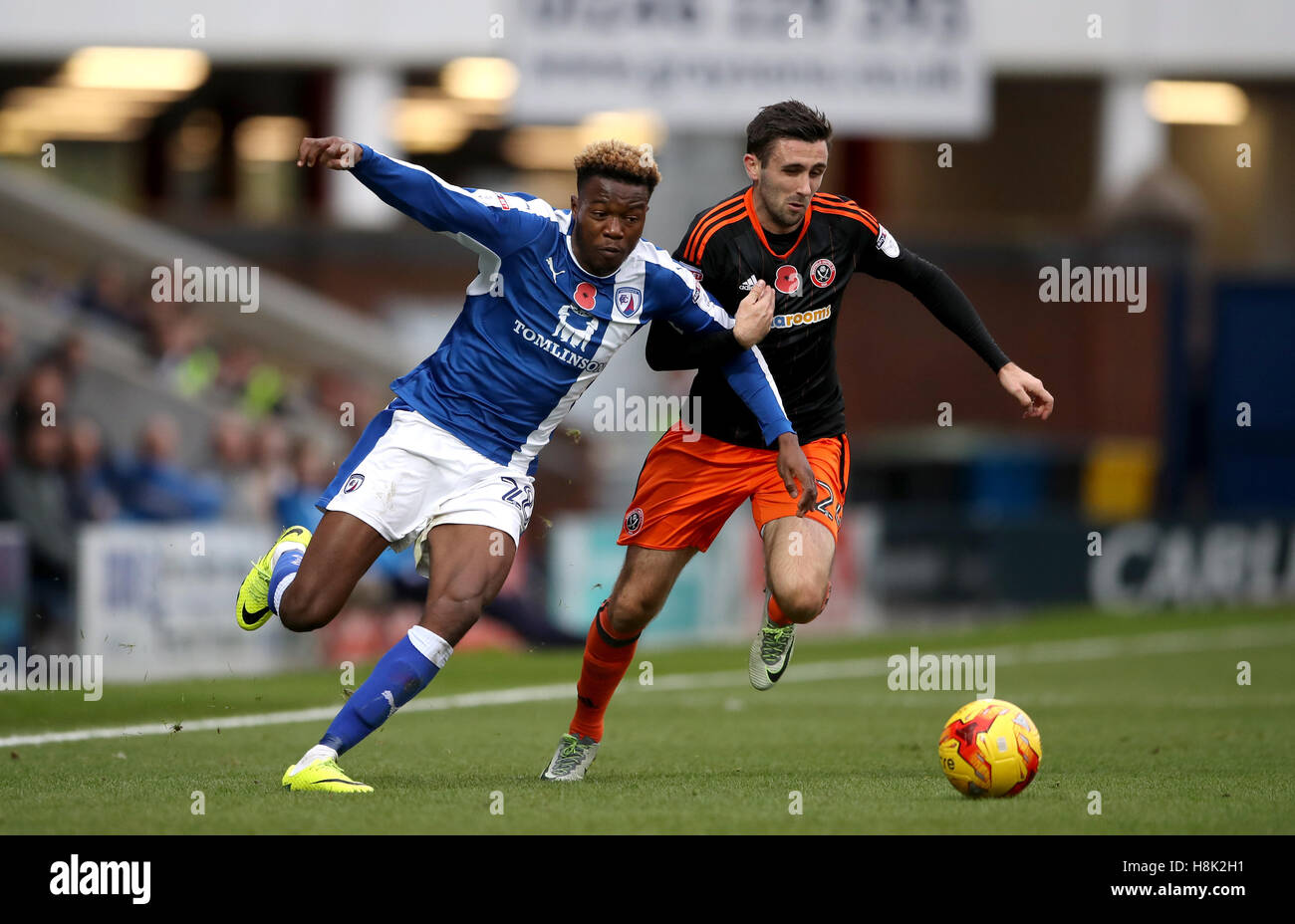 Chesterfield's Gboly Ariyibi (left) and Sheffield United's Daniel ...