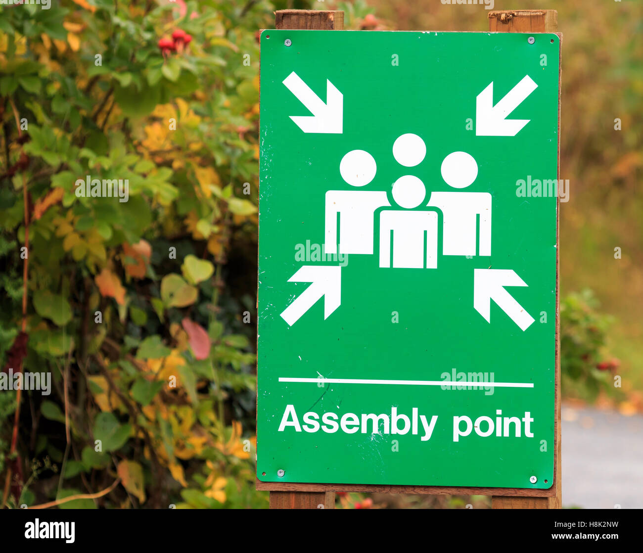 White assembly point sign on hi-res stock photography and images - Alamy