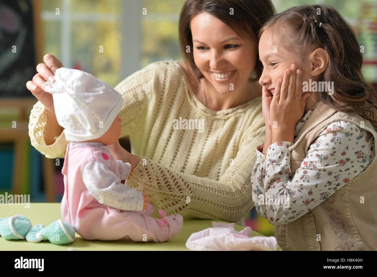 Mother and daughter play Stock Photo - Alamy